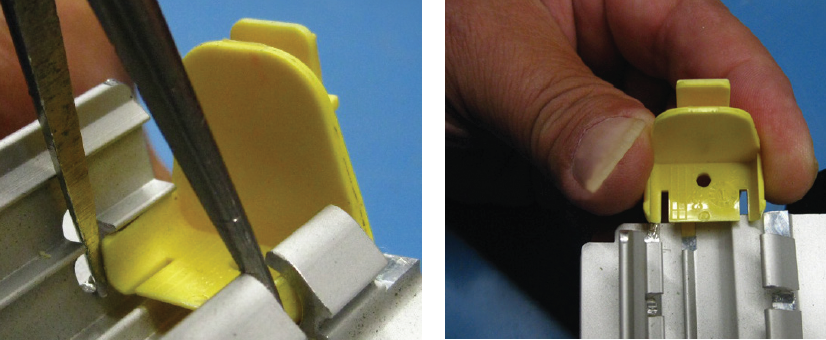 Instructions for replacing the yellow locking clips on the rear door of ...